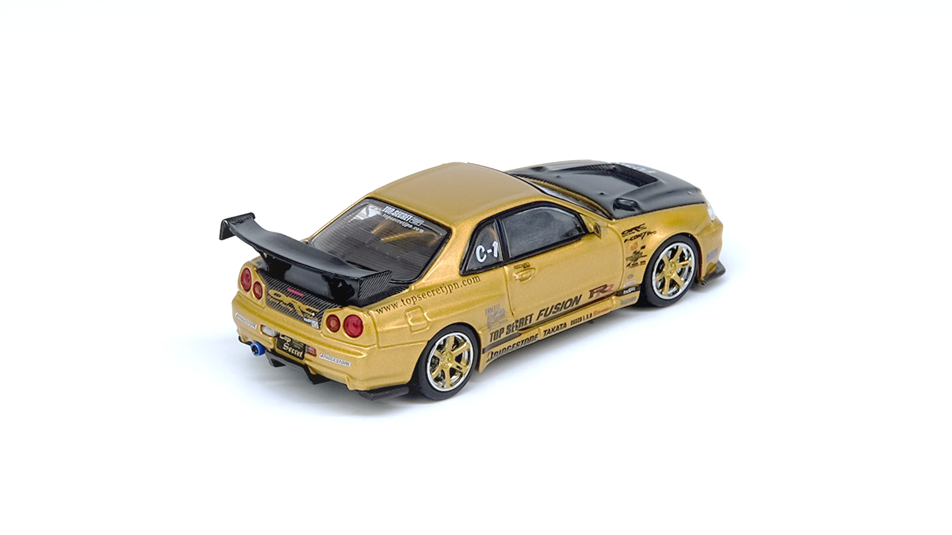 Skyline GT-R (R34) TOP SECRET in Gold - Inno Models