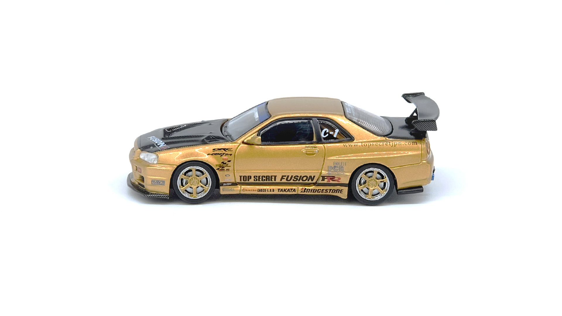 TOP SECRET Skyline GT-R (R34) Gold - Inno Models